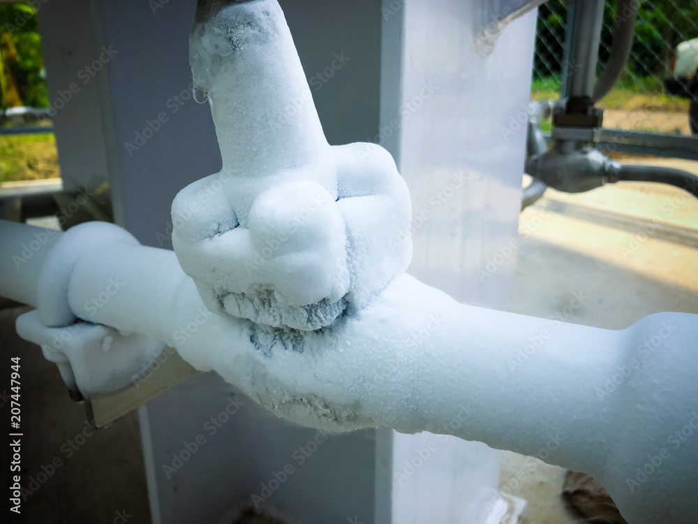 Close up of container with liquid nitrogen,Cold metal pipe smoking from ...