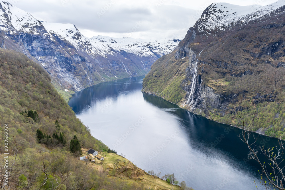 View of Geirangerfjord and Skageflå mountain farm with the Seven ...