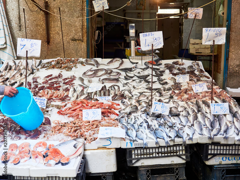 Napoli, April 26, 2018. Stand selling fish, squid, and other seafood at ...