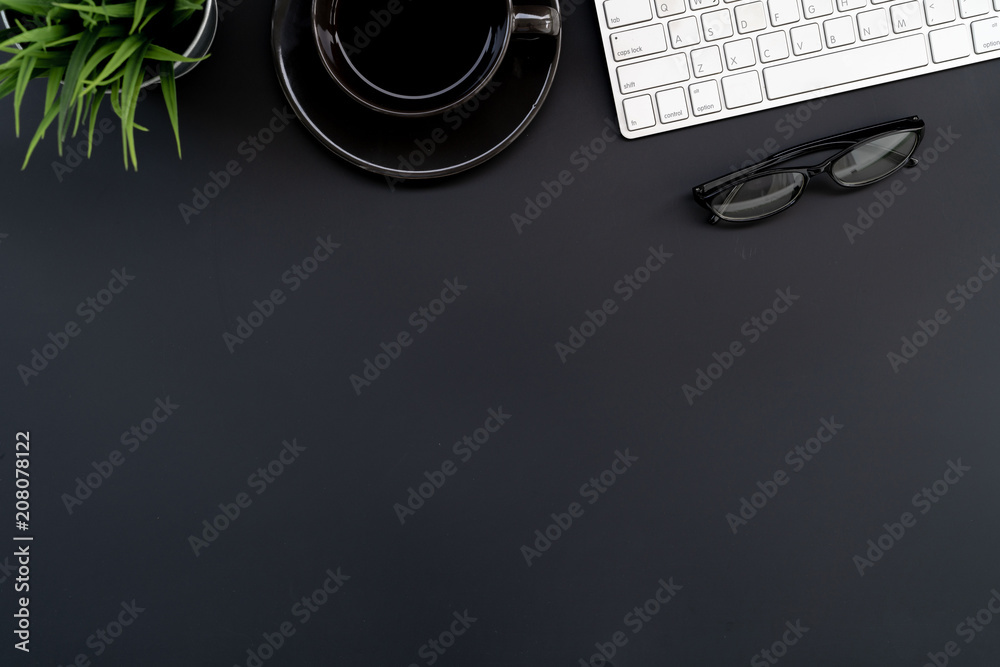 Flat lay of top view modern black desk work table with computer laptop ...