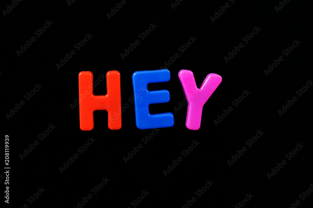 English letters are made of plastic on a black background. Come ...