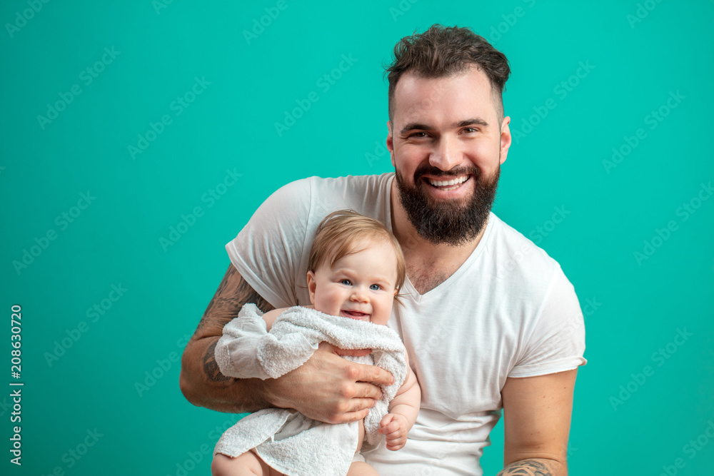 Muscular middle aged happy father holding cute infant adorable baby of ...
