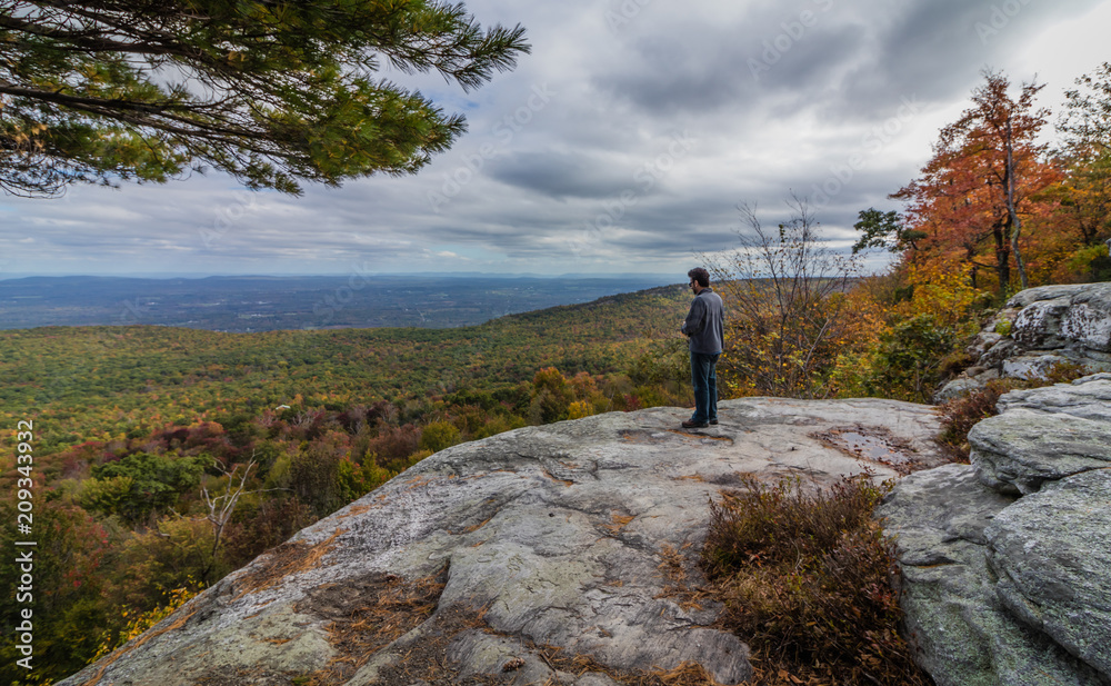 Overlooking the Shawangunk Mountain Range surrounded by bright fall ...