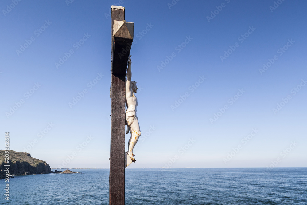 Cross with sculpture Christ crucified,mediterranean sea in maritime ...
