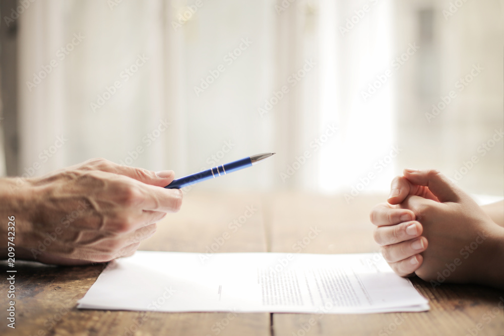Signing a contract Stock Photo | Adobe Stock