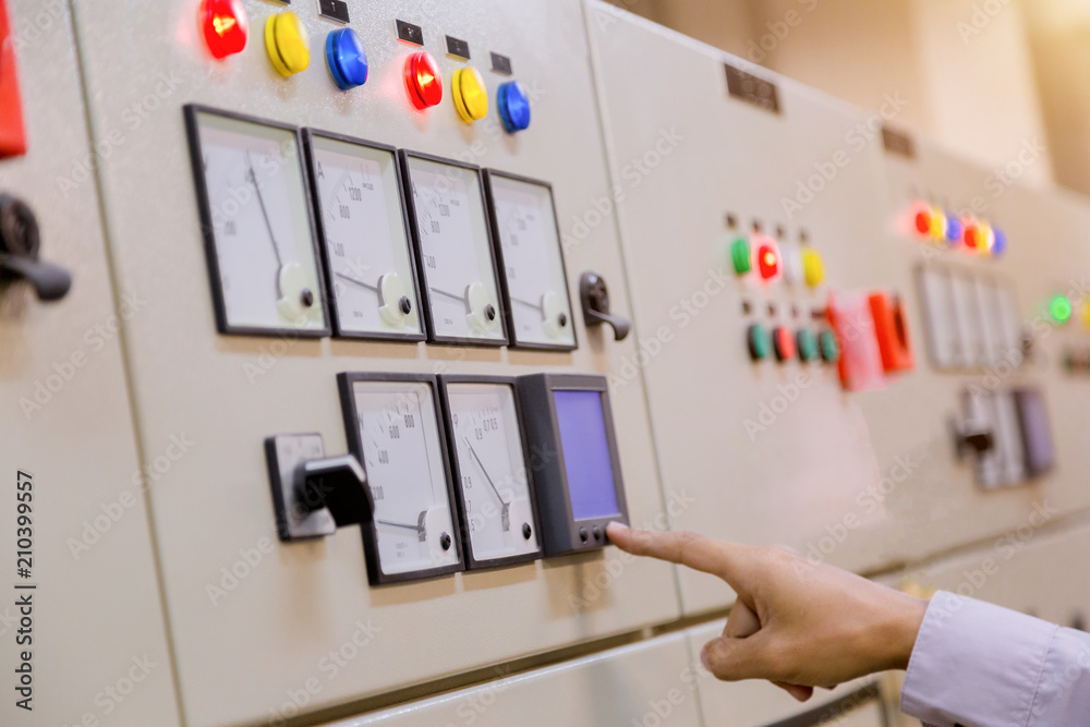 Engineer working on checking and maintenance electrical equipment ...