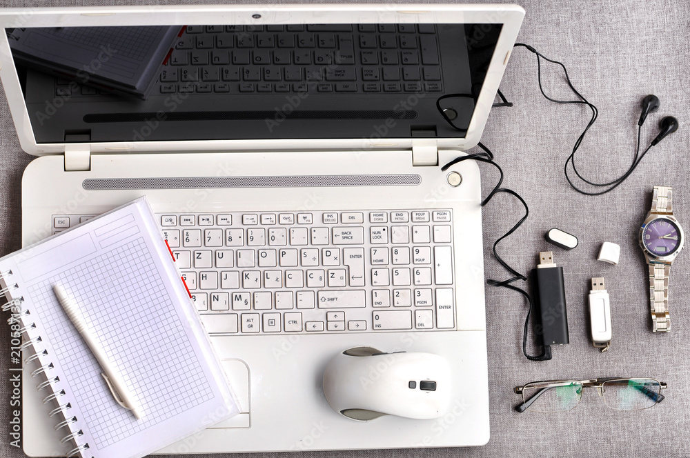 Foto Computer peripherals and laptop accessories. Overhead of modern ...