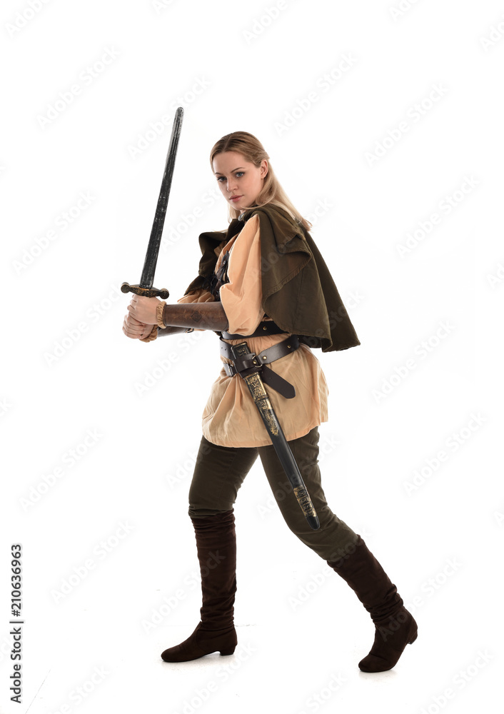 full length portrait of girl wearing brown medieval costume,. standing ...