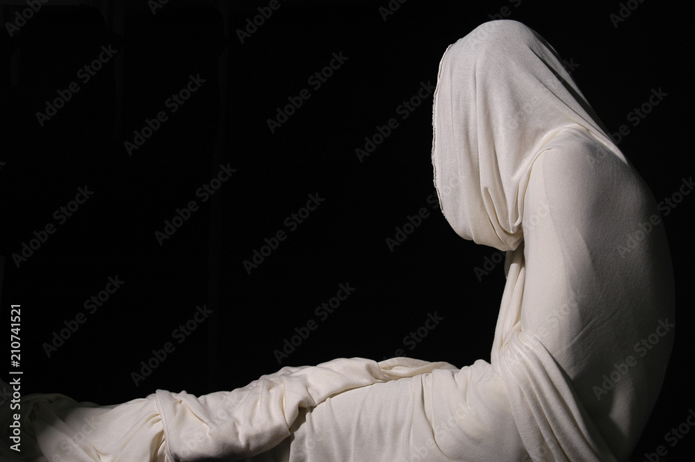 Jesus Christ rising from the dead wrapped in white cloth. Easter Sunday ...