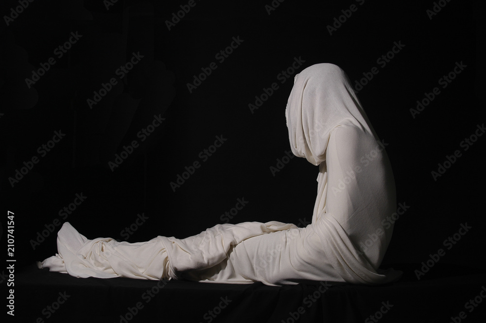 Jesus Christ rising from the dead wrapped in white cloth. Easter Sunday ...