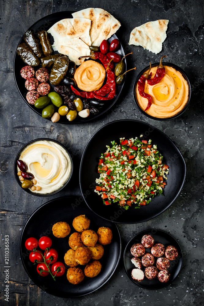 Arabic traditional cuisine. Middle Eastern meze platter with pita ...