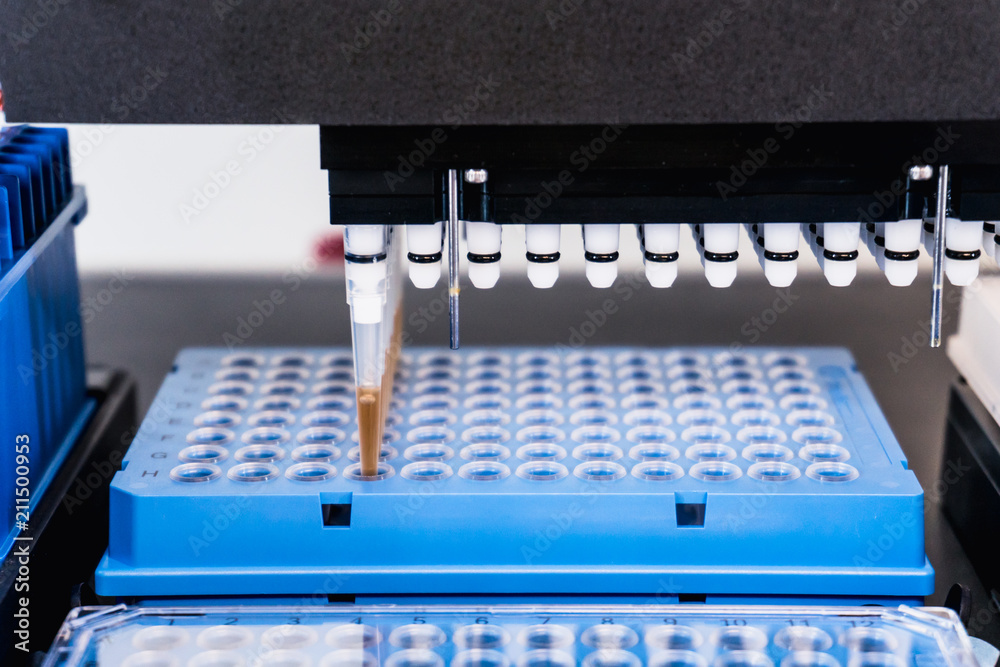 Automation in the clinical laboratory. Pipetting robot laboratory ...