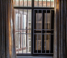 Barred House Window Free Stock Photo - Public Domain Pictures