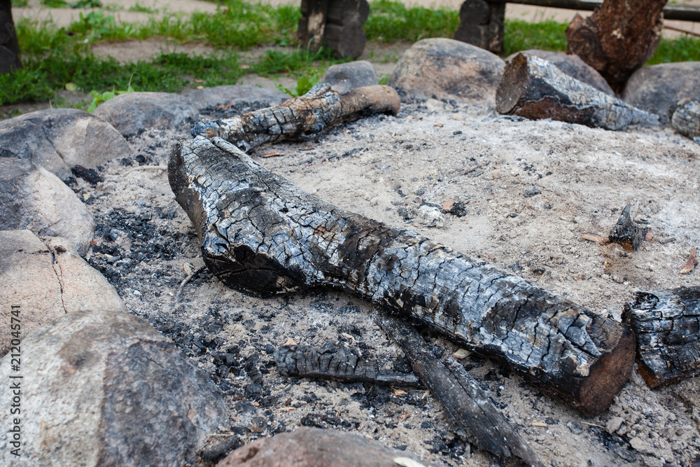 Black charred coal of logs of an extinct fire Stock Photo | Adobe Stock