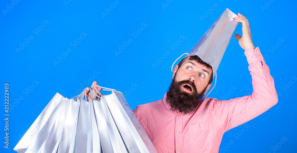 Bearded man with retarded face and open mouth wearing paper bag on his ...