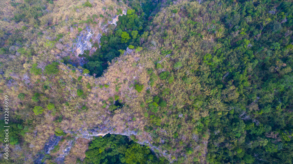 aerial photography above amazing cave. Tham Than Lod Yai is the big ...