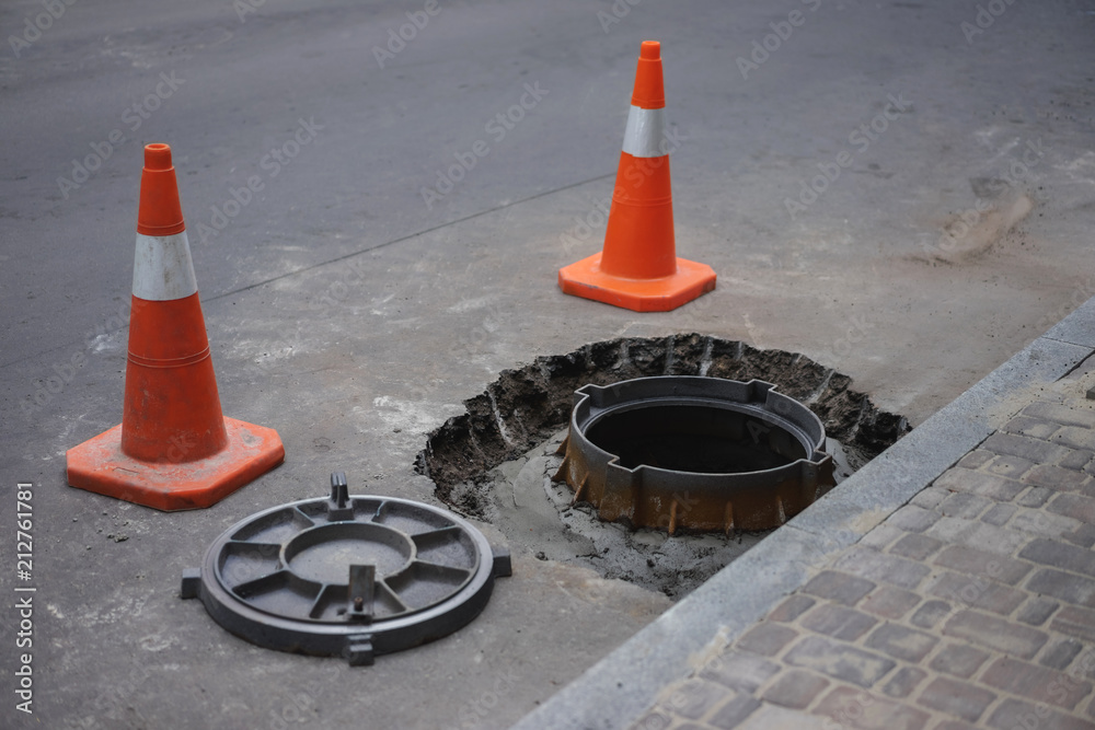 manhole cover replacement, sewer system repair, sewerage; roadworks ...