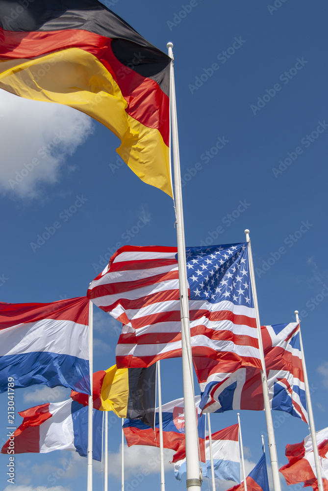Colorful flags at the Peace Museum of Memorial de Caen or D Day museum ...
