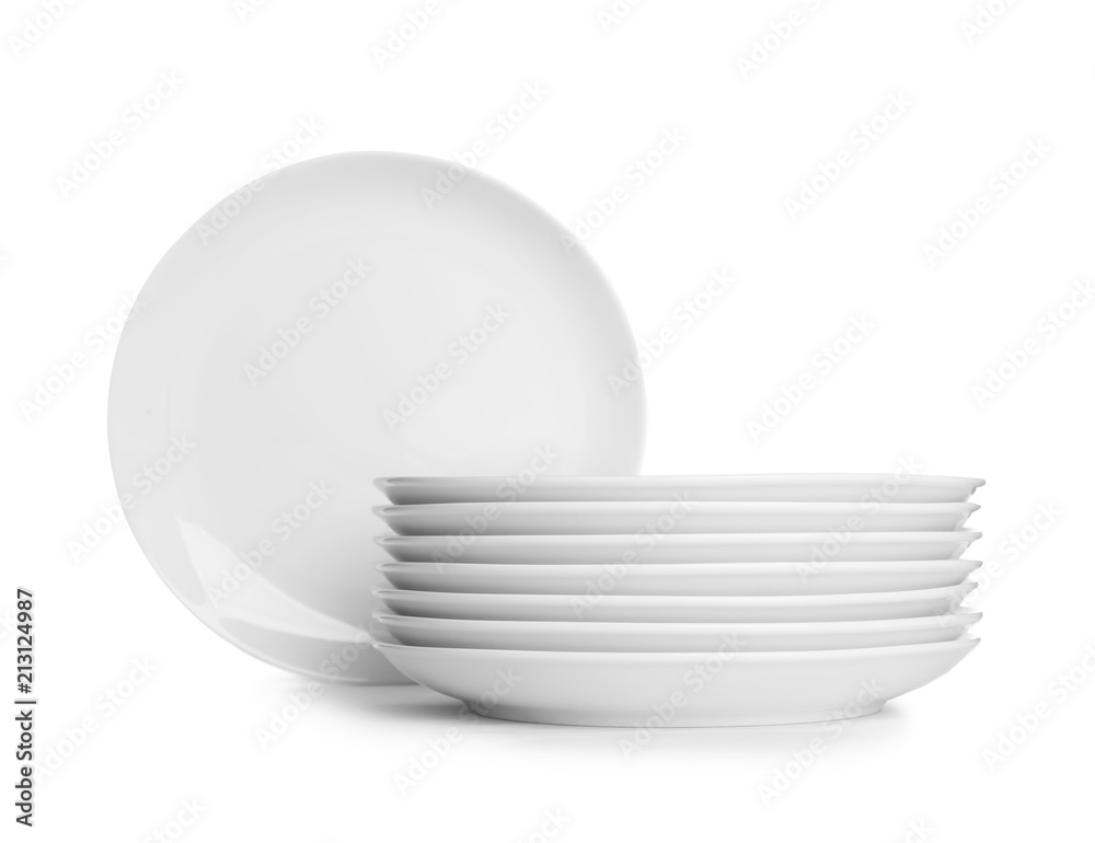 Stack of ceramic dishware on white background Stock Photo | Adobe Stock