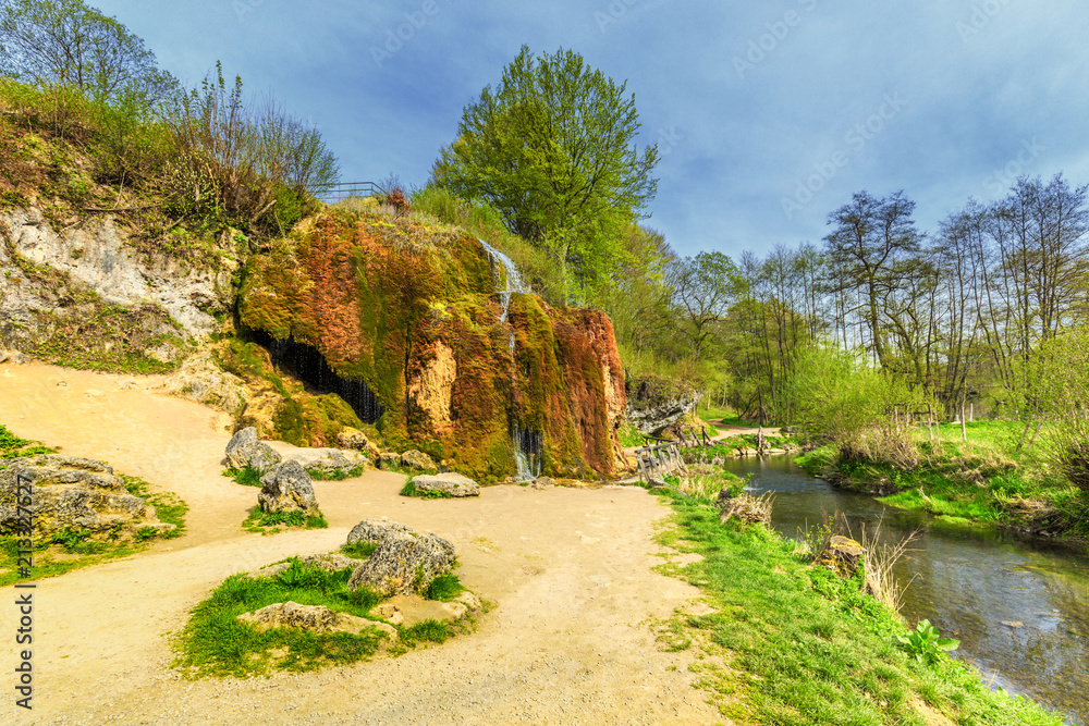 Natural monument Dreimühlen waterfall in German Eifel overgrown with ...