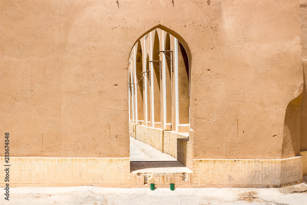 Beautiful authentic carved arc in the house wall. Streets of old town ...