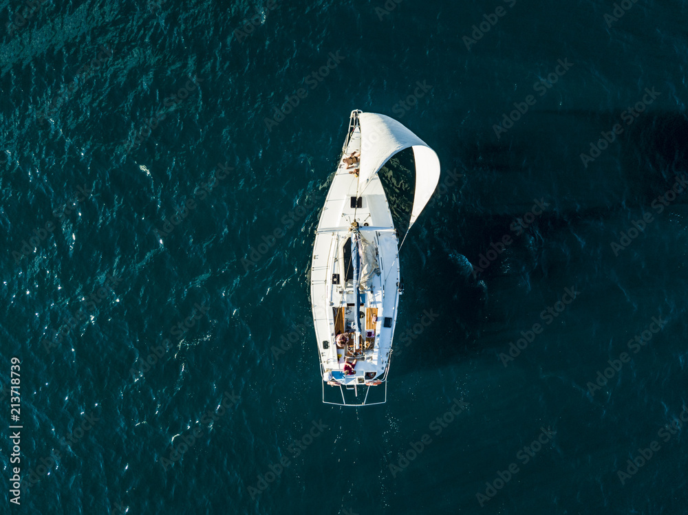Foto de Stock aerial photo of sailboat yacht top view, isolated on the ...