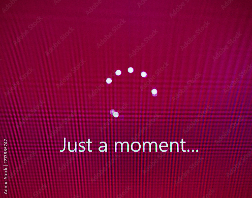 Just a moment sign during operating system installation on a modern ...