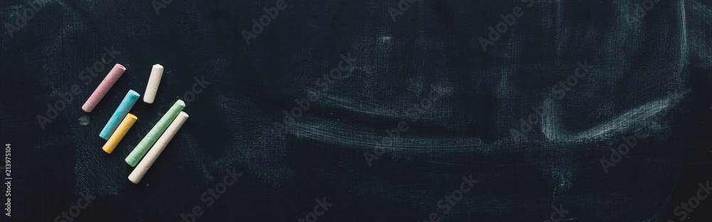 Colorful chalk on blackboard Stock Photo | Adobe Stock
