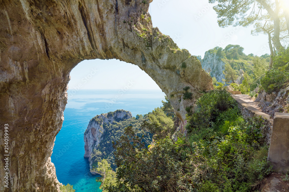 Arco Naturale is natural arch on coast of Capri island, Italy 스톡 사진 ...