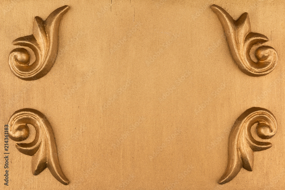 Top view of a luxurious gold stucco on a gold background. Stock Photo ...