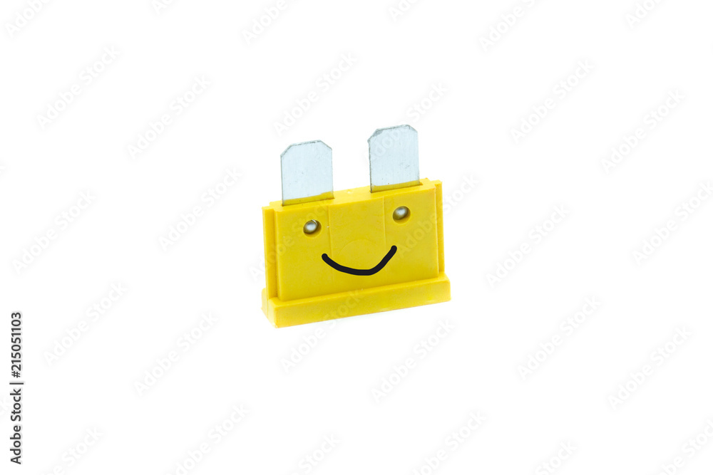Smiling car fuse, yellow color. To repair the electrical circuit in the ...