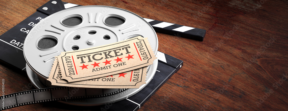 Film reel with retro cinema tickets on top, on a movie clapper, wooden ...