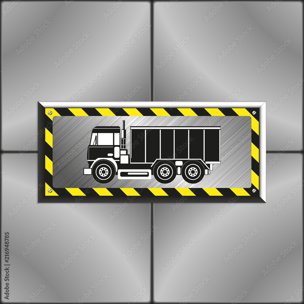 Heavy truck. Image on an industrial metal plate, bolted to the wall of ...