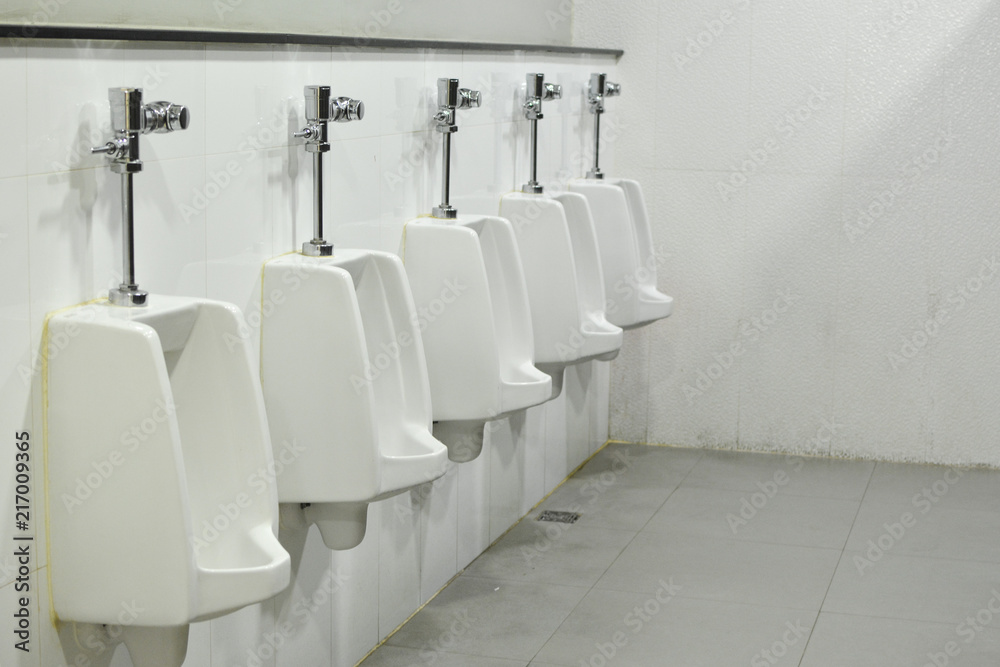 Urinals in the toilet inside shopping mall Stock Photo | Adobe Stock