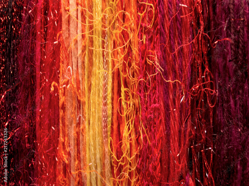 Vertical striped background composed of varying colors and textures of ...