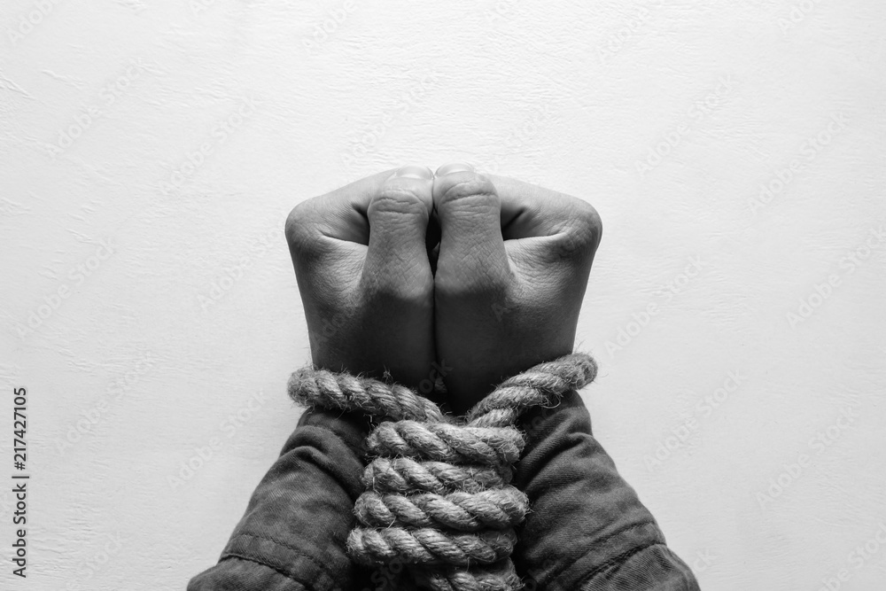 bound hands. stop human trafficking Stock Photo | Adobe Stock