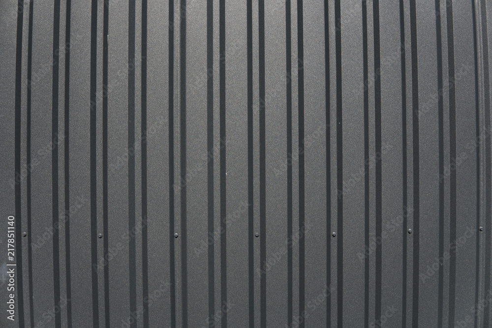 Brown metal plate. Siding. Seamless surface of galvanized steel. Industrial building wall made ...