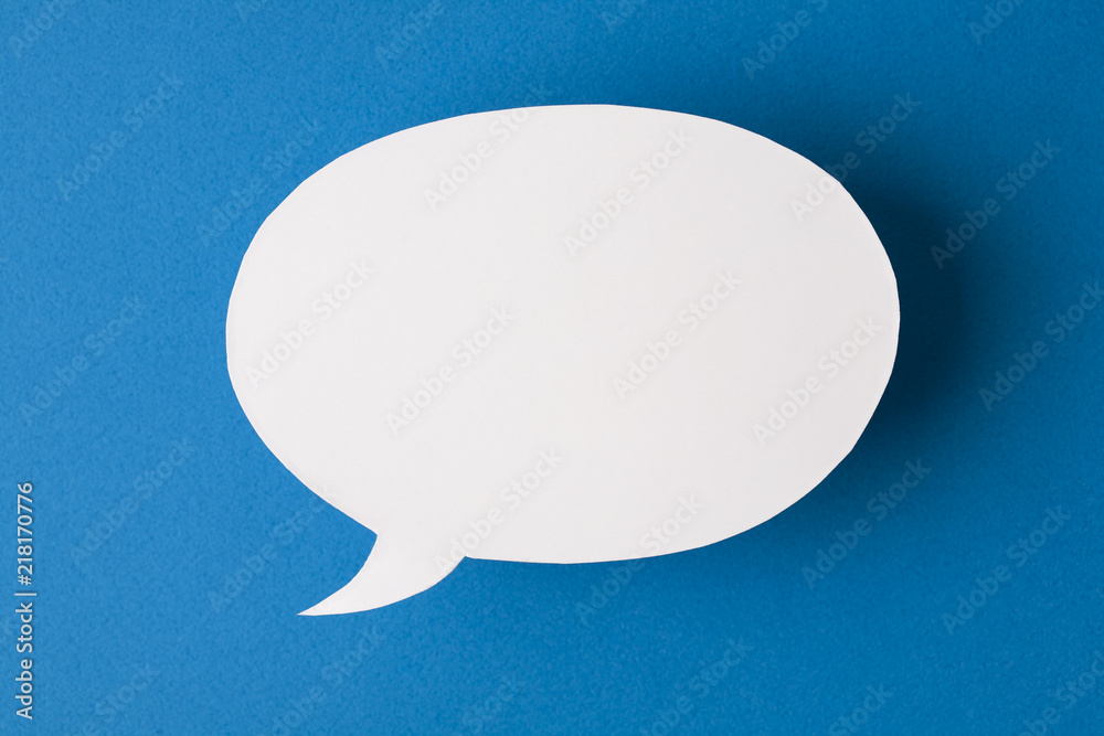 speech bubble on blue background Stock Photo | Adobe Stock