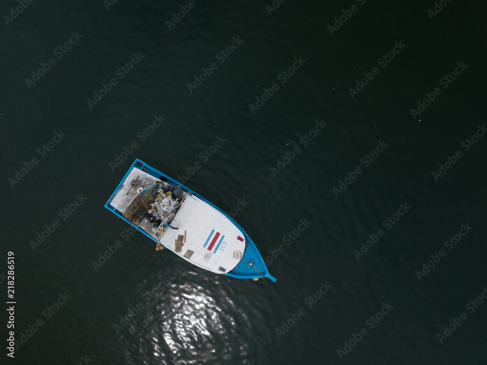 Costa Rican Fishermans boats in the water as seen from an aerial drone ...