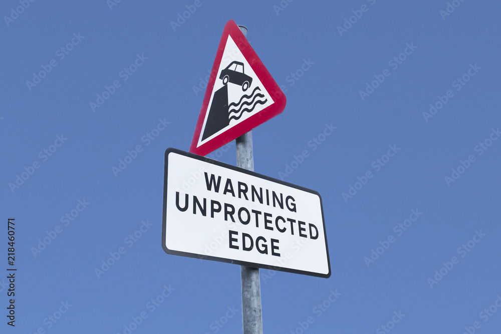 Unprotected edge warning sign at harbour port for car and vehicle ...