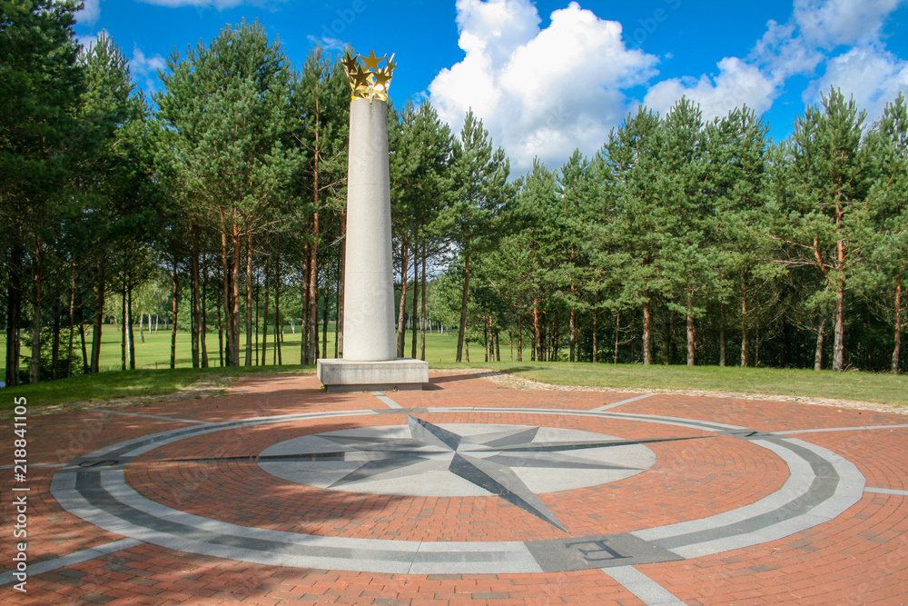 Geographic centre of Europe, with crown of stars on a column and wind ...