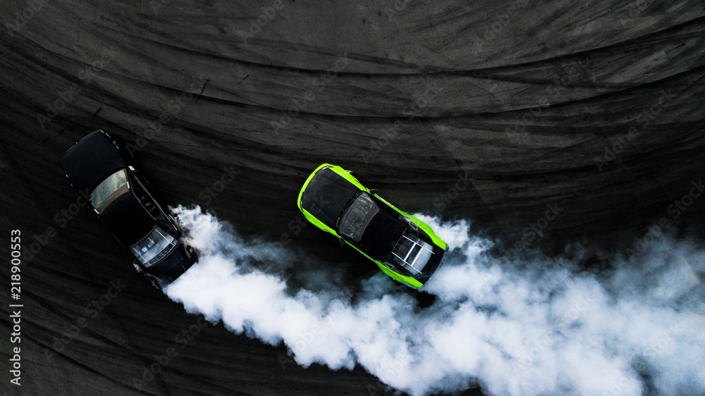 Stock-Foto „Aerial top view two cars drifting battle on race track, Two ...