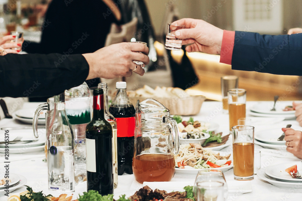 Corporate business man toasting at dinner party table hands close-up ...