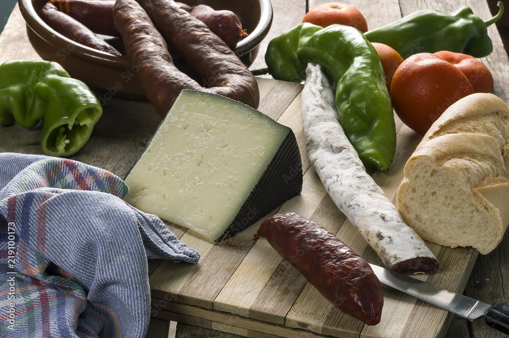 Tabla de embutidos , con queso y pan Stock Photo | Adobe Stock