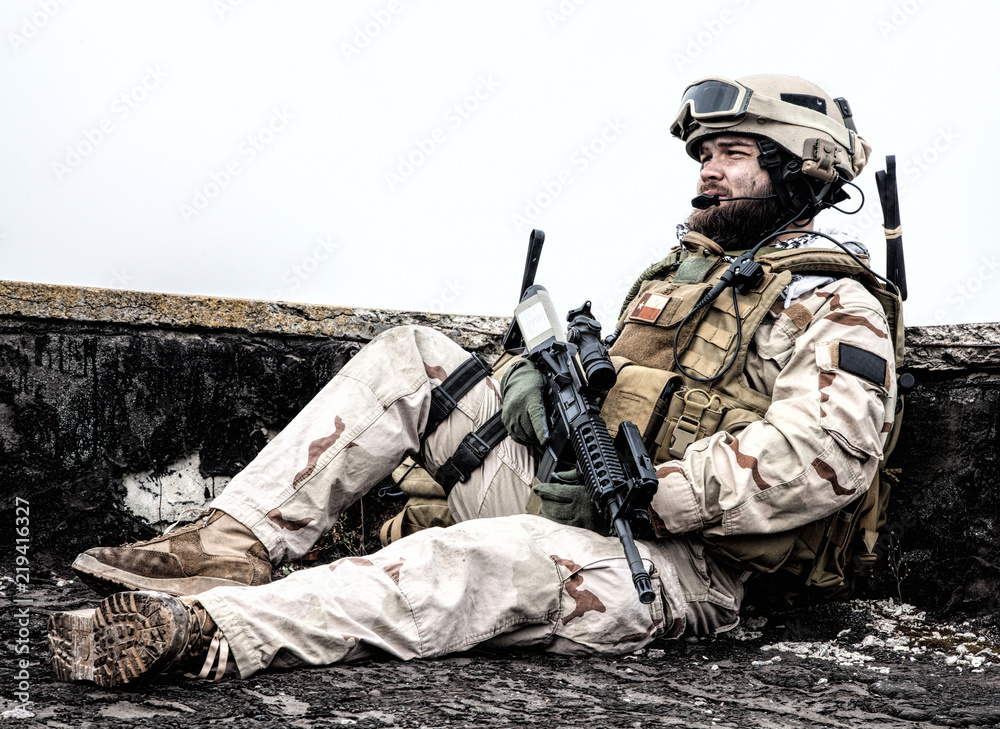 U.S. Navy SEAL infantryman, commando marksman in battle U.S. Navy SEAL infantryman, commando marksman in battle