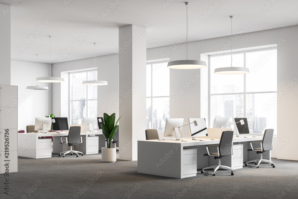 White office corner, columns, computer desks Stock Photo | Adobe Stock