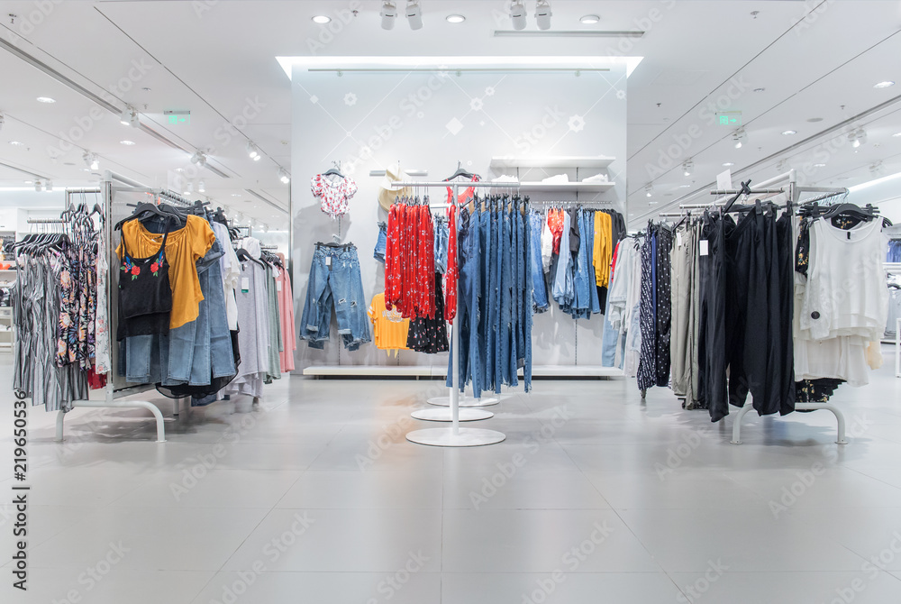 Various shop clothing in ladies' clothing store in summer Stock Photo ...