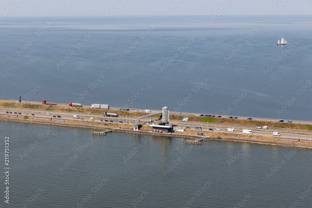 Aerial view Dutch afsluitdijk with watchtower and monument ir. Lely ...