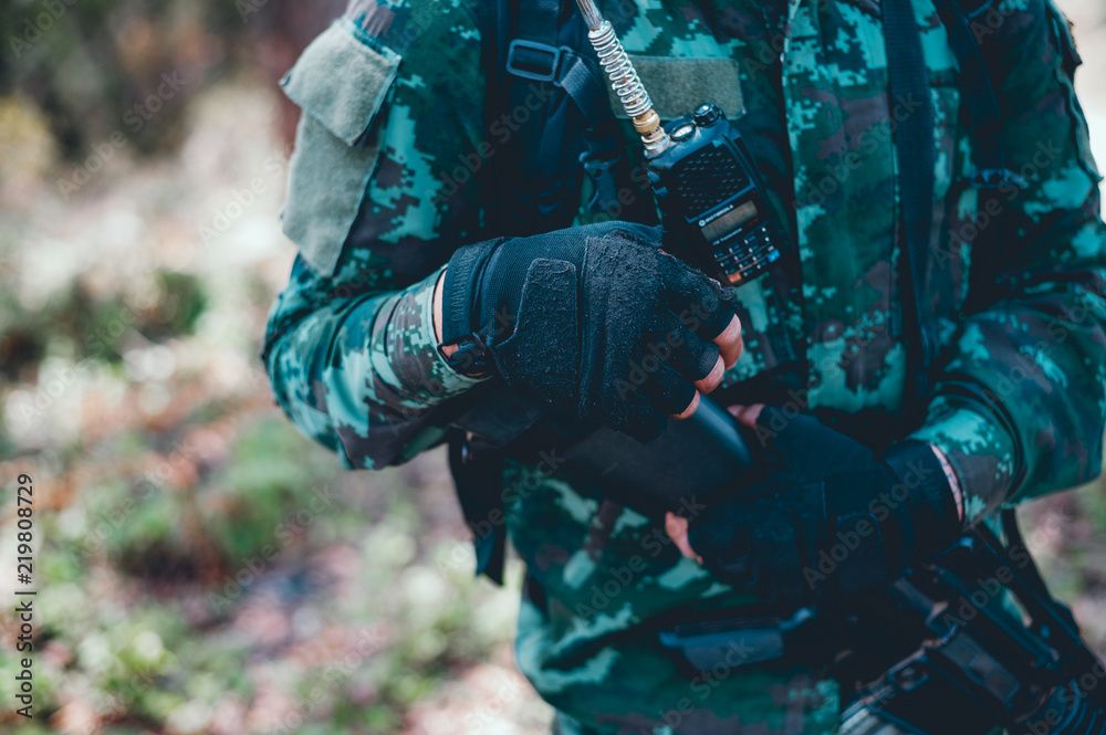 Soldiers are using the radio. And use the map For communication between ...
