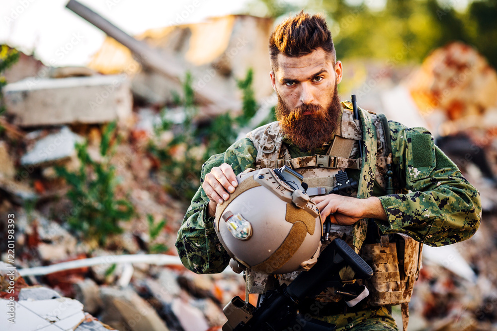 rangers with assault rifles on battlefield background. army, military ...